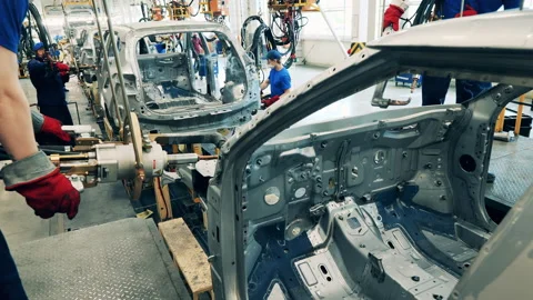 Car Manufacturing Workers Stock Footage ~ Royalty Free Stock Videos | Pond5