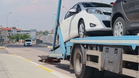 A car is loaded onto the carrier | Stock Video | Pond5