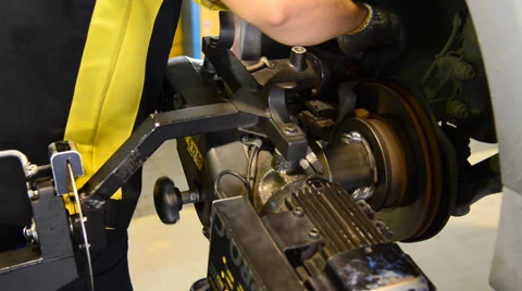 Mechanic Turning Brake Stock Footage ~ Royalty Free Stock Videos | Pond5