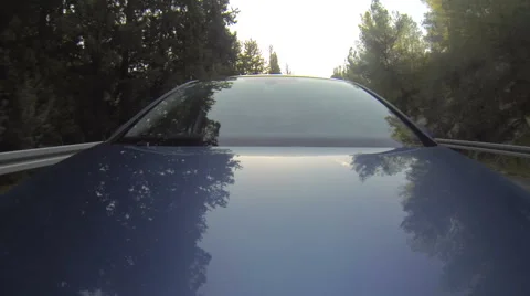 Car mounted shot of a blue car driving w... | Stock Video | Pond5