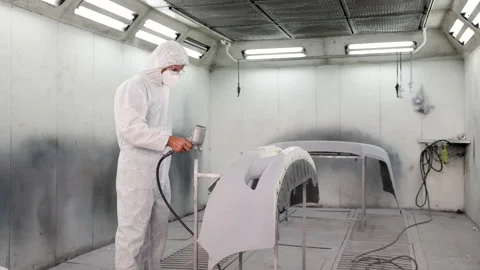 Car painter with mask using spray gun pa... | Stock Video | Pond5