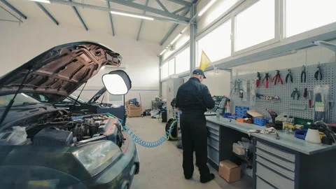 Car Repair Service. The Employee Works A... | Stock Video | Pond5