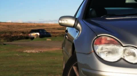 Car Showcase - Car Driving in Background... | Stock Video | Pond5