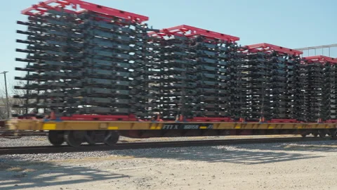 Car truck frames stacked on railroad fla... | Stock Video | Pond5
