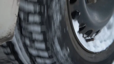 Car wheel is spinning while driving. Clo... | Stock Video | Pond5