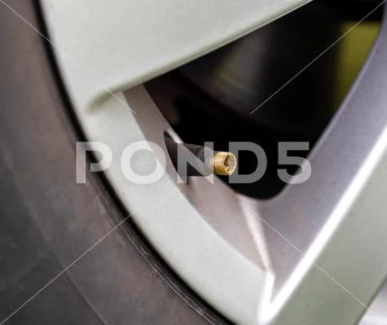 Car wheel spool, close-up. Wheel deflation concept, malfunction Stock ...