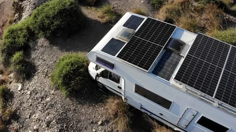 Caravan with solar panels on roof camp o... | Stock Video | Pond5
