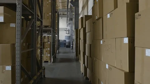 Cardboard Boxes on shelves Inside Storag... | Stock Video | Pond5