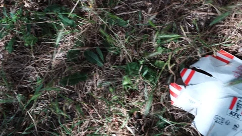 cardboard package of KFC abandoned on th... | Stock Video | Pond5