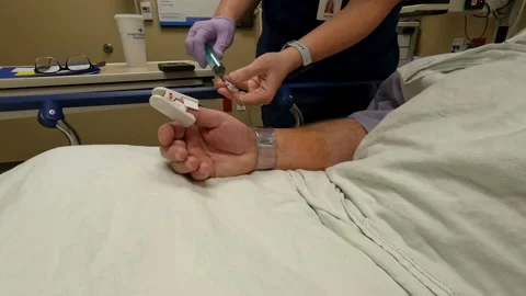 Cardiac Patient arm IV hospital bed hear... | Stock Video | Pond5