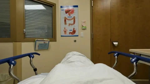 Cardiac Patient laying in hospital bed h... | Stock Video | Pond5