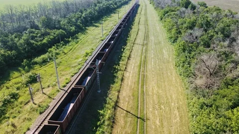 Cargo carrier train transporting wagons ... | Stock Video | Pond5