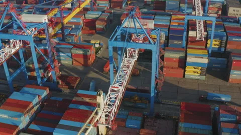 Cargo containers being unloaded by a gan... | Stock Video | Pond5
