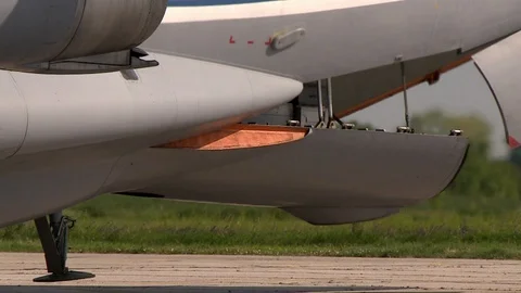 Cargo plane at airport opens rear ramp f... | Stock Video | Pond5