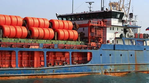 Cargo ship with loaded gas pipes | Stock Video | Pond5