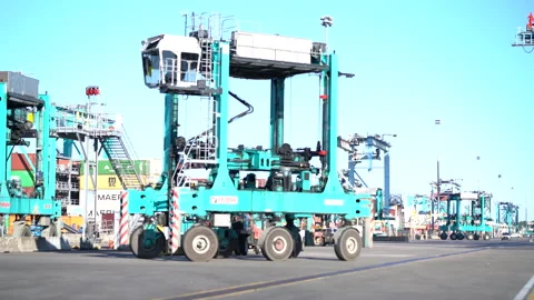 A cargo shipping container transporter a... | Stock Video | Pond5