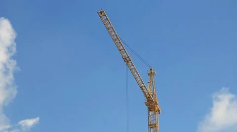 Cargo tower crane swing on background bl... | Stock Video | Pond5