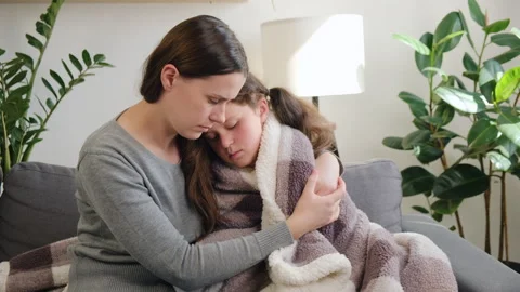Caring young mother hugging, sick upset ... | Stock Video | Pond5