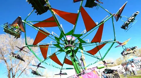 Carnival Glider Ride Bright Colors | Stock Video | Pond5
