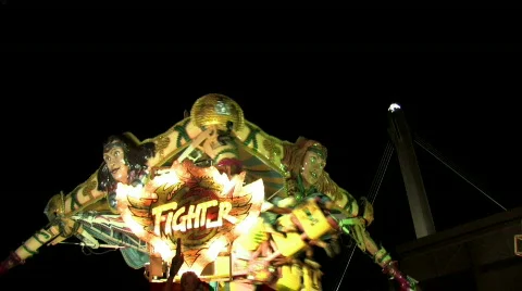 Carnival night fighter ride M HD | Stock Video | Pond5