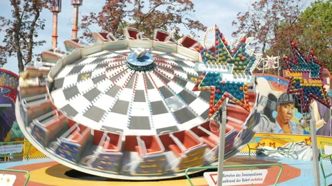 Carousel roundabout. Swinging turning ar... | Stock Video | Pond5