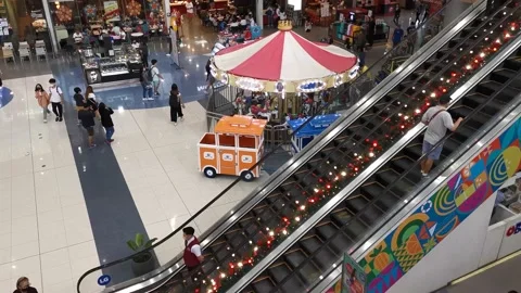 Carousel spinning inside a shopping mall... | Stock Video | Pond5