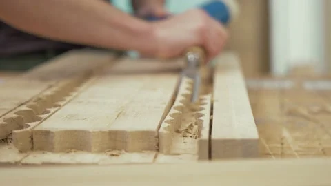 Carpenter chiseling out recess in oak ti... | Stock Video | Pond5