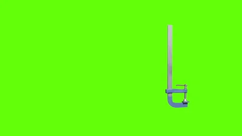 Carpenter clamp on a green background | Stock Video | Pond5
