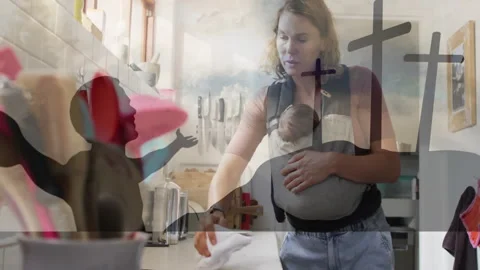 Carrying baby in sling, mother cleaning ... | Stock Video | Pond5
