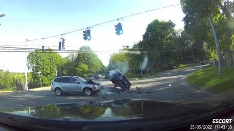 Cars Have a Head on Collision at Interse... | Stock Video | Pond5