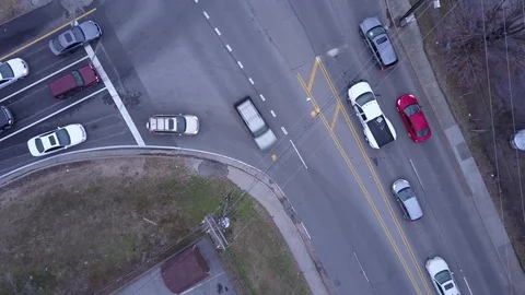 Cars at intersection aerial view 4k | Stock Video | Pond5