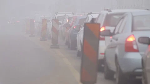 Cars Stuck in Traffic Jam on Misty Foggy... | Stock Video | Pond5