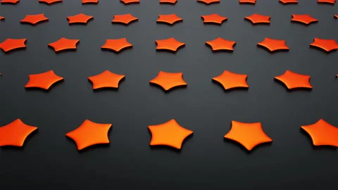 Cartoon orange stars on black background... | Stock Video | Pond5