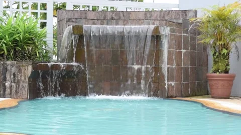 Cascading water in the swimming pool. | Stock Video | Pond5