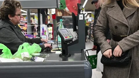 Cashier Stock Footage ~ Royalty Free Stock Videos | Page 2