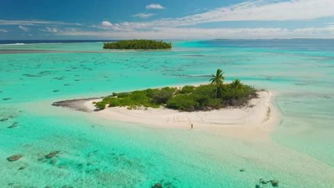 Castaway writing help on a desert island... | Stock Video | Pond5