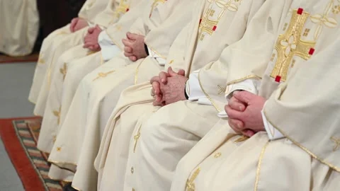 Catholic priests in liturgical vestments... | Stock Video | Pond5