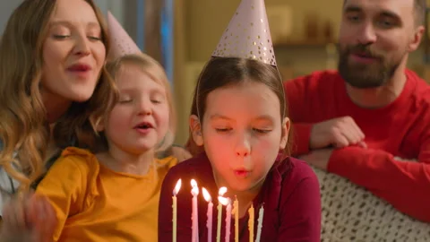 Caucasian family sing happy birthday lit... | Stock Video | Pond5