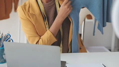 Caucasian female fashion designer works ... | Stock Video | Pond5