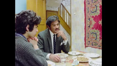 Caucasian man comes home to indian famil... | Stock Video | Pond5