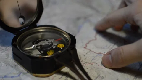 caucasian man's hand using compass and m... | Stock Video | Pond5