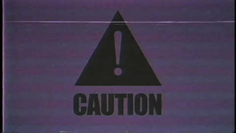 Caution warning sign on TV with VHS dama... | Stock Video | Pond5