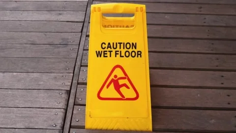 Caution Wet Floor Slip Hazard Warning Wa... | Stock Video | Pond5