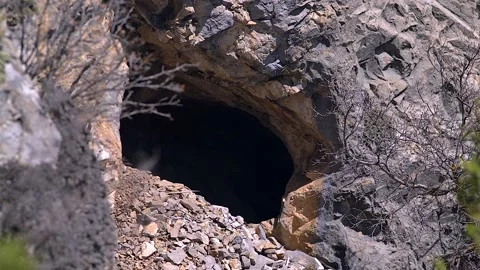 Cave Opening in Mountainside Cliff, real... | Stock Video | Pond5