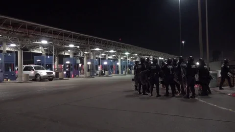 CBP officers standing with riot shields ... | Stock Video | Pond5