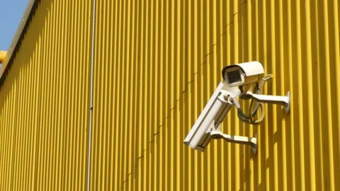 CCTV cameras on facade of industrial bui... | Stock Video | Pond5