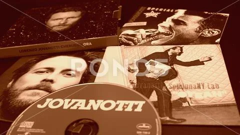 CD and artwork of the Italian singer-songwriter, rapper and disc jockey ...
