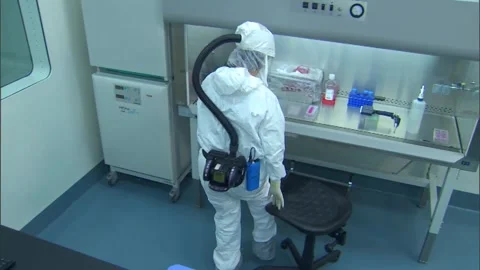 CDC Lab workers working on infectious di... | Stock Video | Pond5