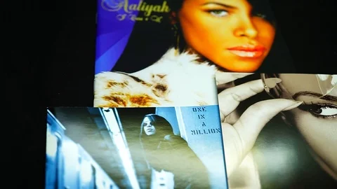 CDs and artwork of the American singer, ... | Stock Video | Pond5