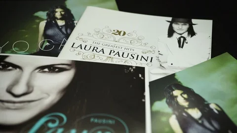 CDs and artwork of Italian singer LAURA ... | Stock Video | Pond5